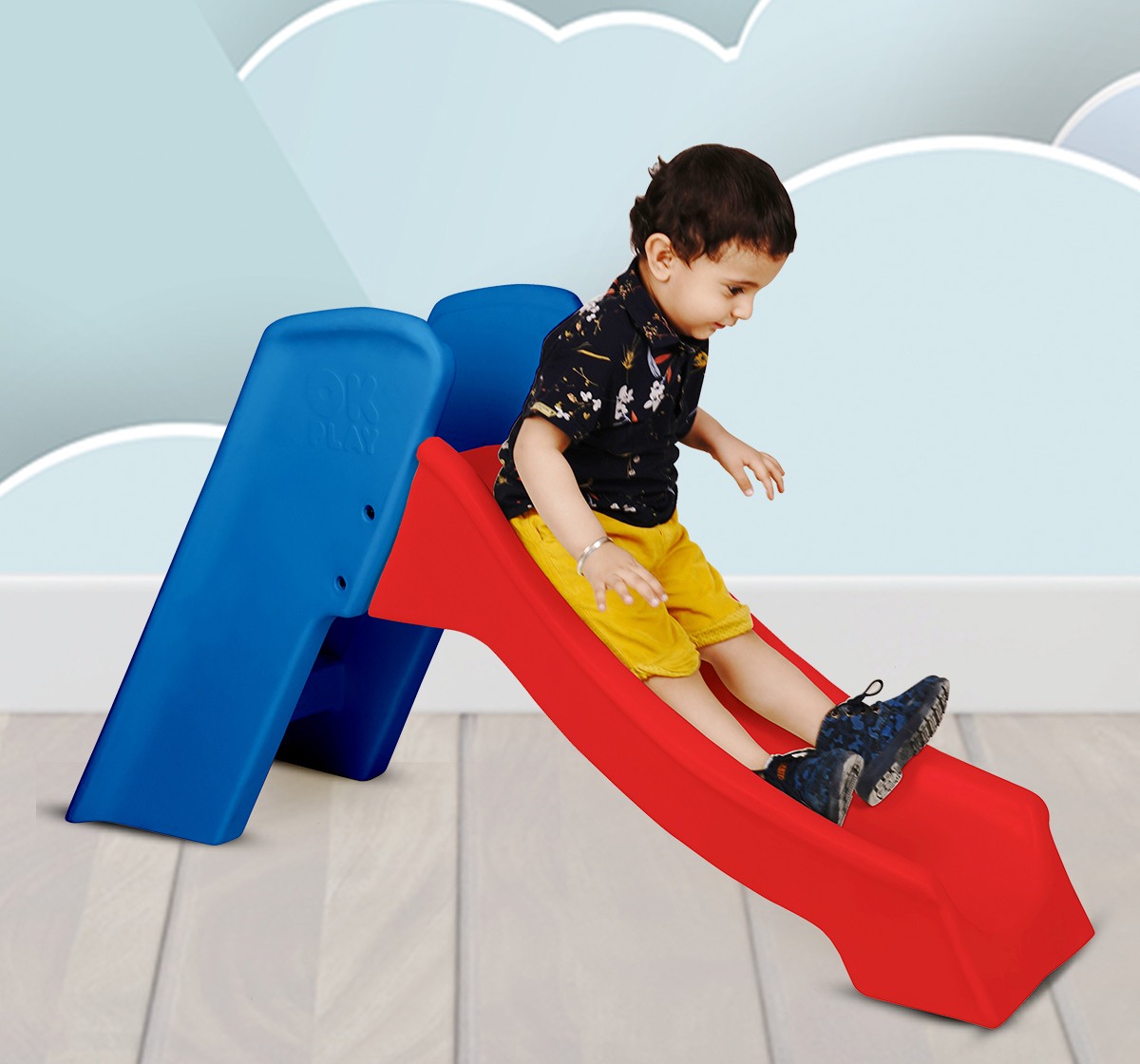 child falling down slide