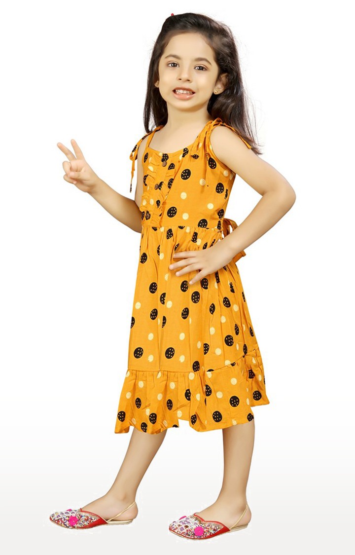 Girls Yellow Rayon Polka Dots Frocks